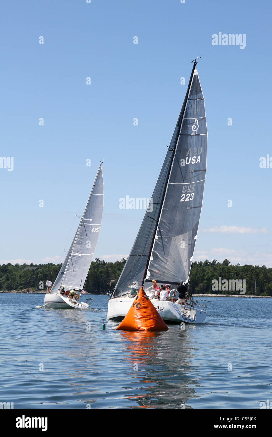 Boats leaving the mark Stock Photo - Alamy