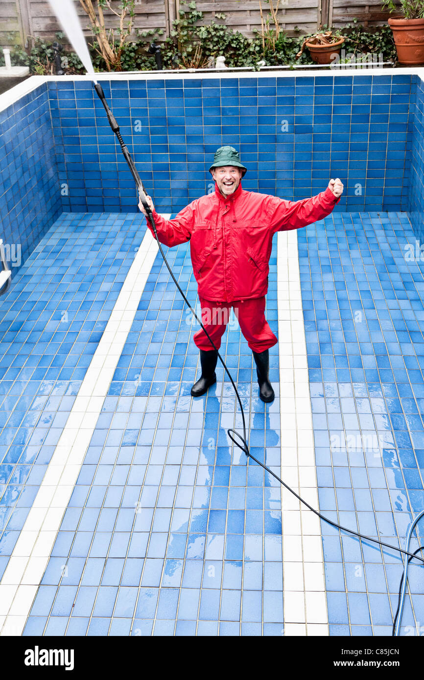 Cleaner swimming pool man in hi-res stock photography and images - Alamy