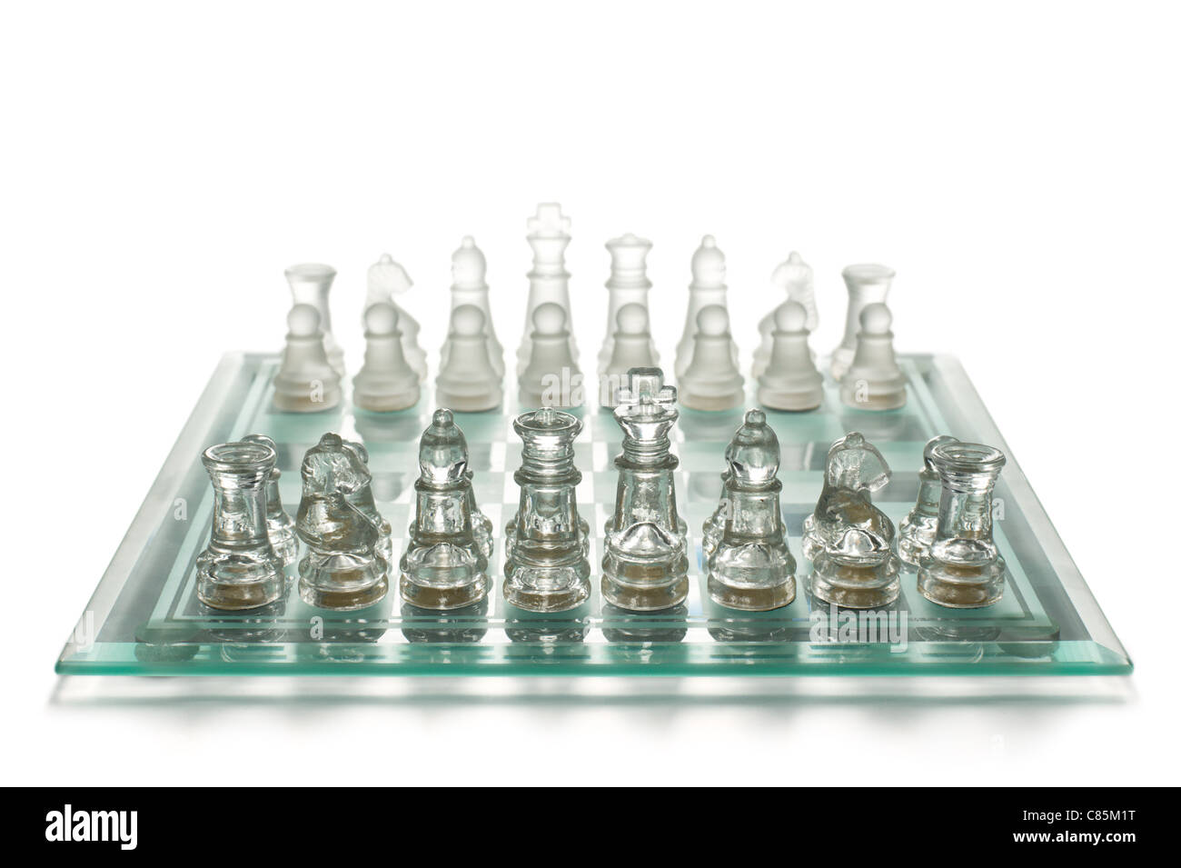 Glass chess on chess board Stock Photo - Alamy