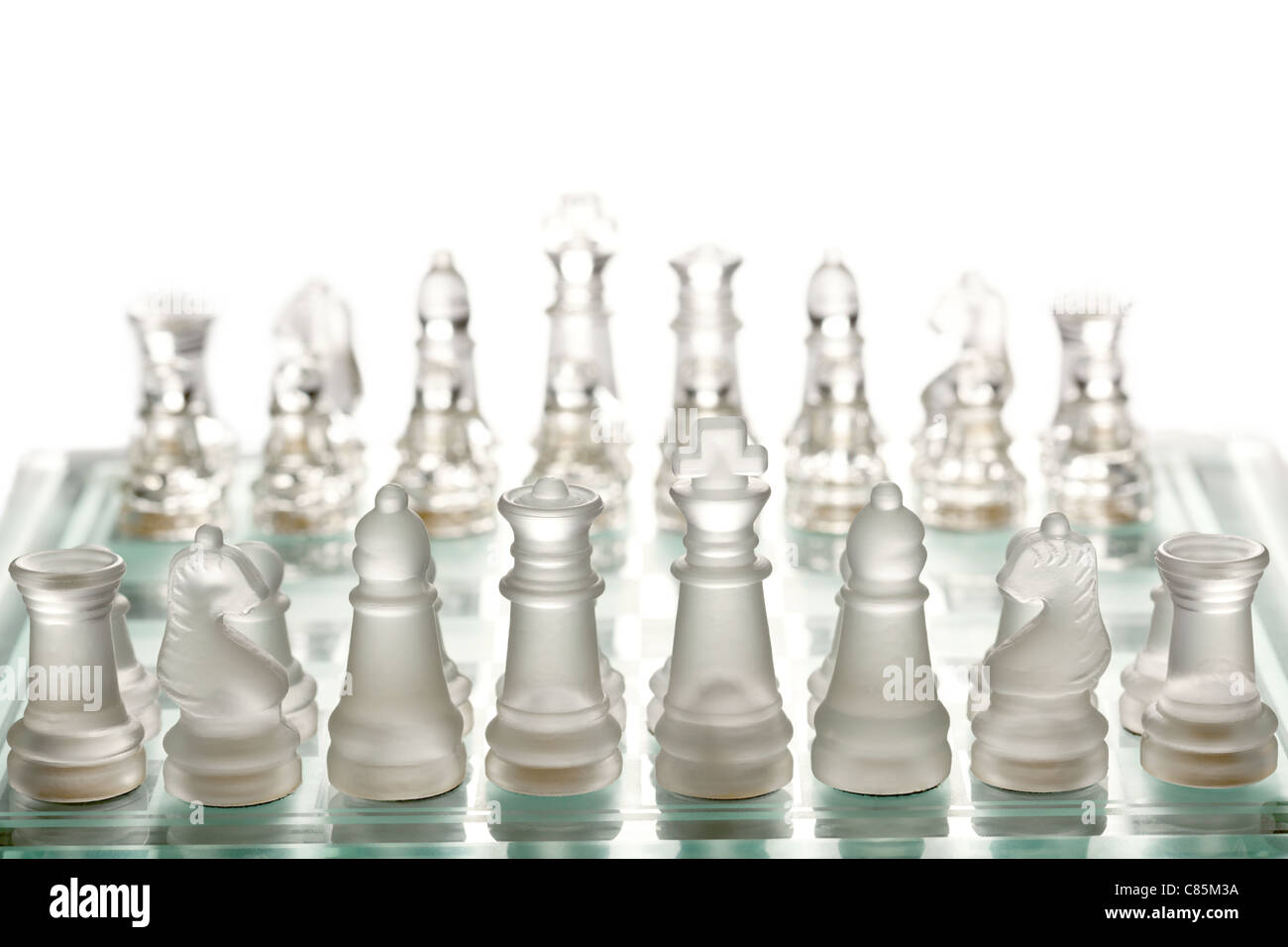 Glass chess on chess board Stock Photo - Alamy