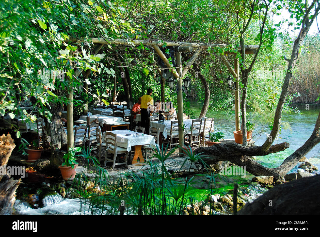 AKYAKA, TURKEY. A riverside restaurant on the banks of the Azmak river ...