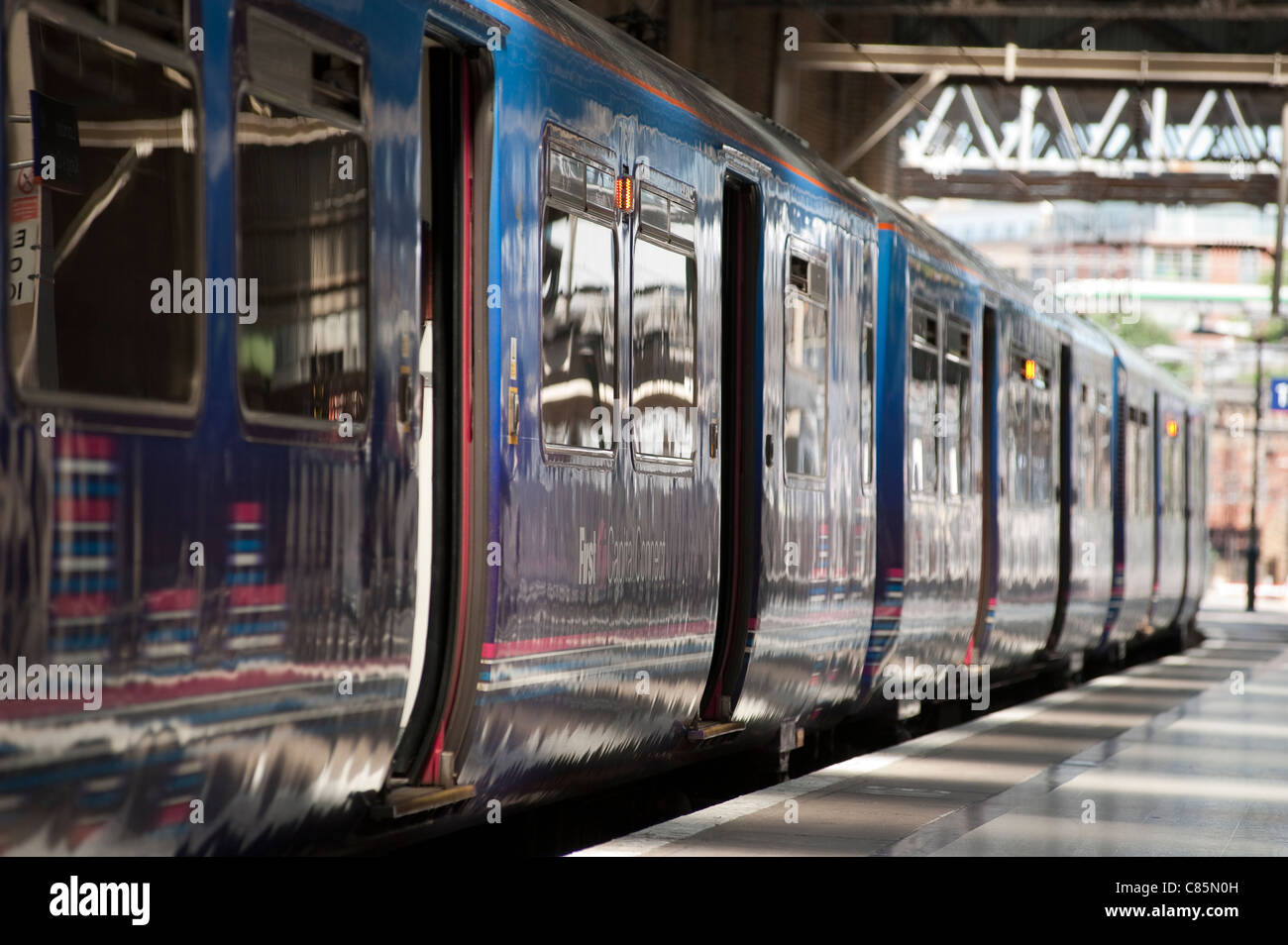 Train in First Capital Connect livery waiting at a railway station in ...