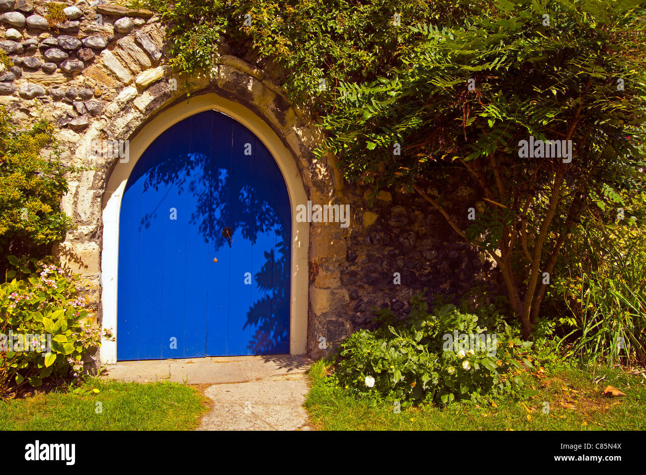 Blue Church Door in the yard of St Peter's church in Sandwich, Kent in ...