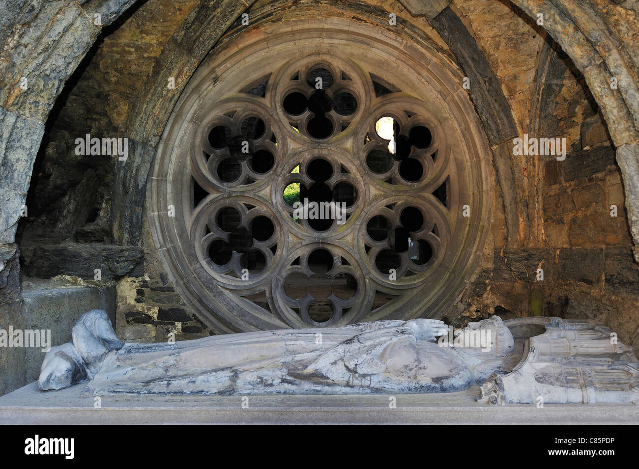 Monk's tomb and Gothic rose window at the Villers Abbey ruins, an ...
