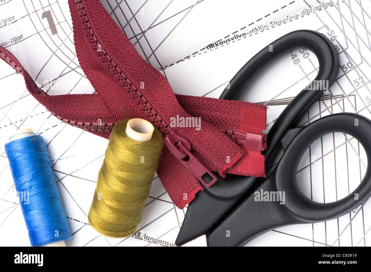 sewing pattern with sew instrument close up Stock Photo - Alamy