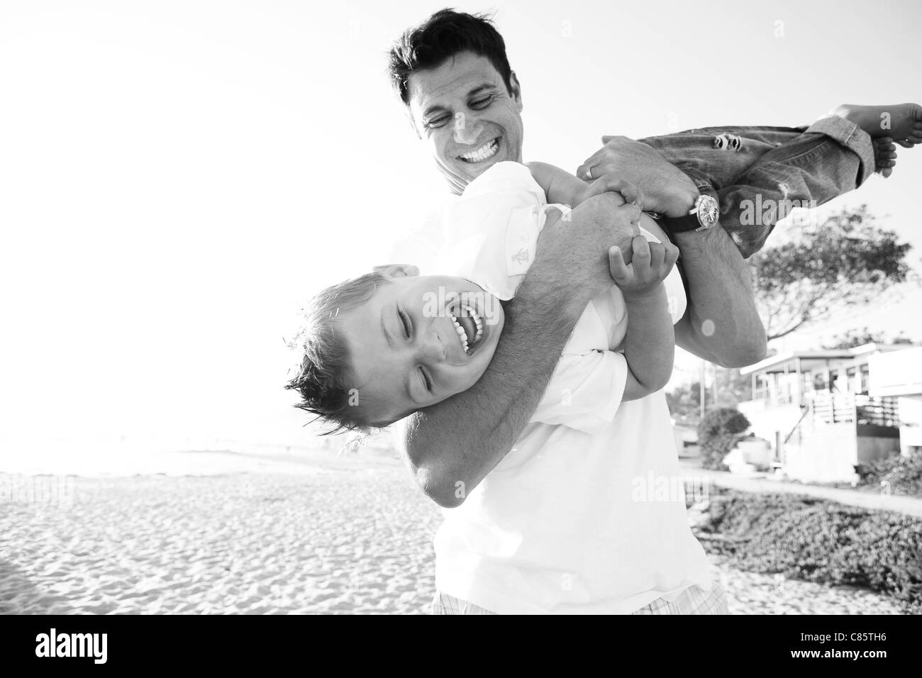 Children playing dad Black and White Stock Photos & Images - Alamy