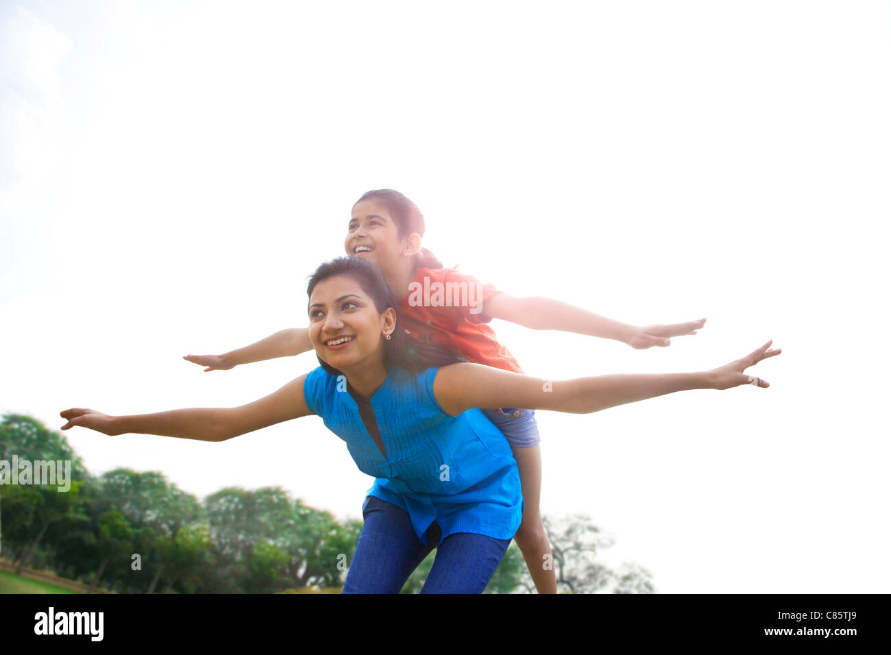 Parents child balancing hi-res stock photography and images - Alamy