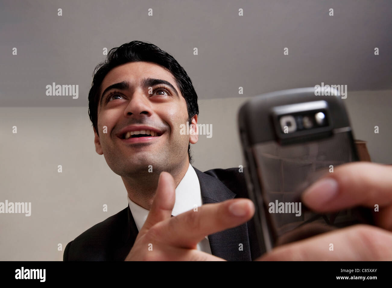 Pointing To Cell Phone High Resolution Stock Photography and Images - Alamy