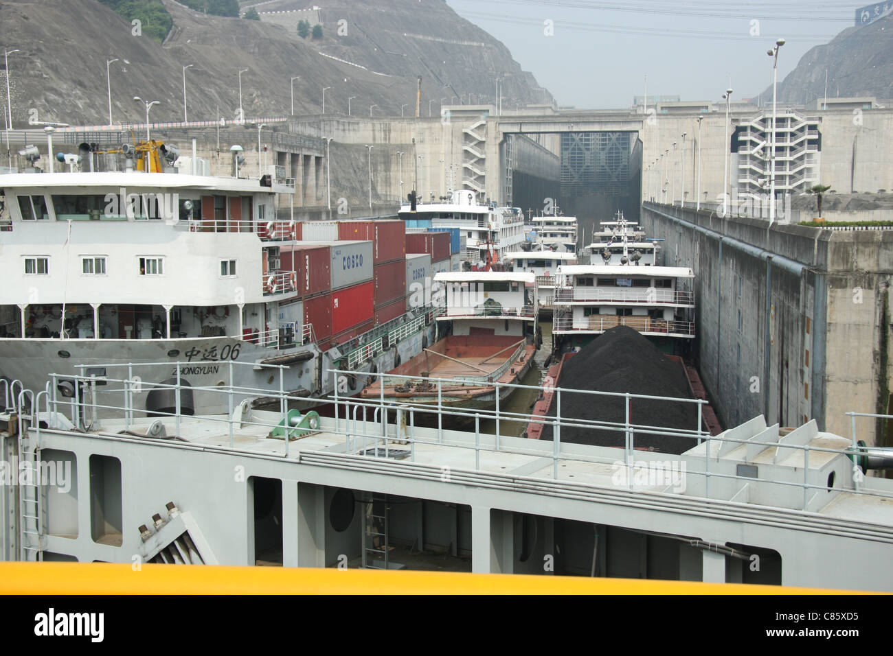 Freighter traffic heading downstream through the locks at Three Gorges ...