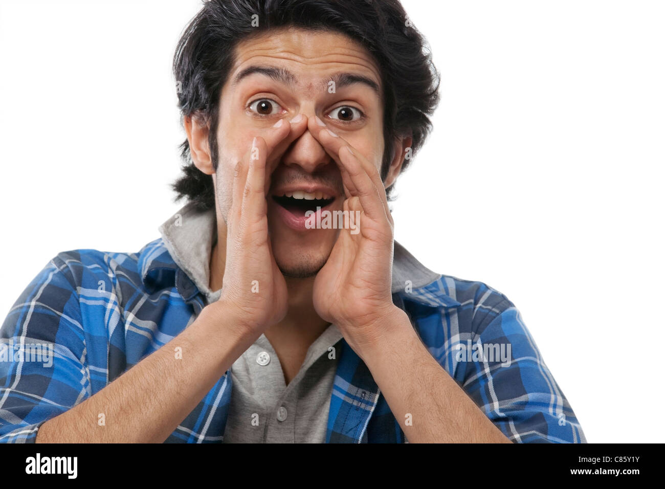 Young boy cheering Stock Photo - Alamy