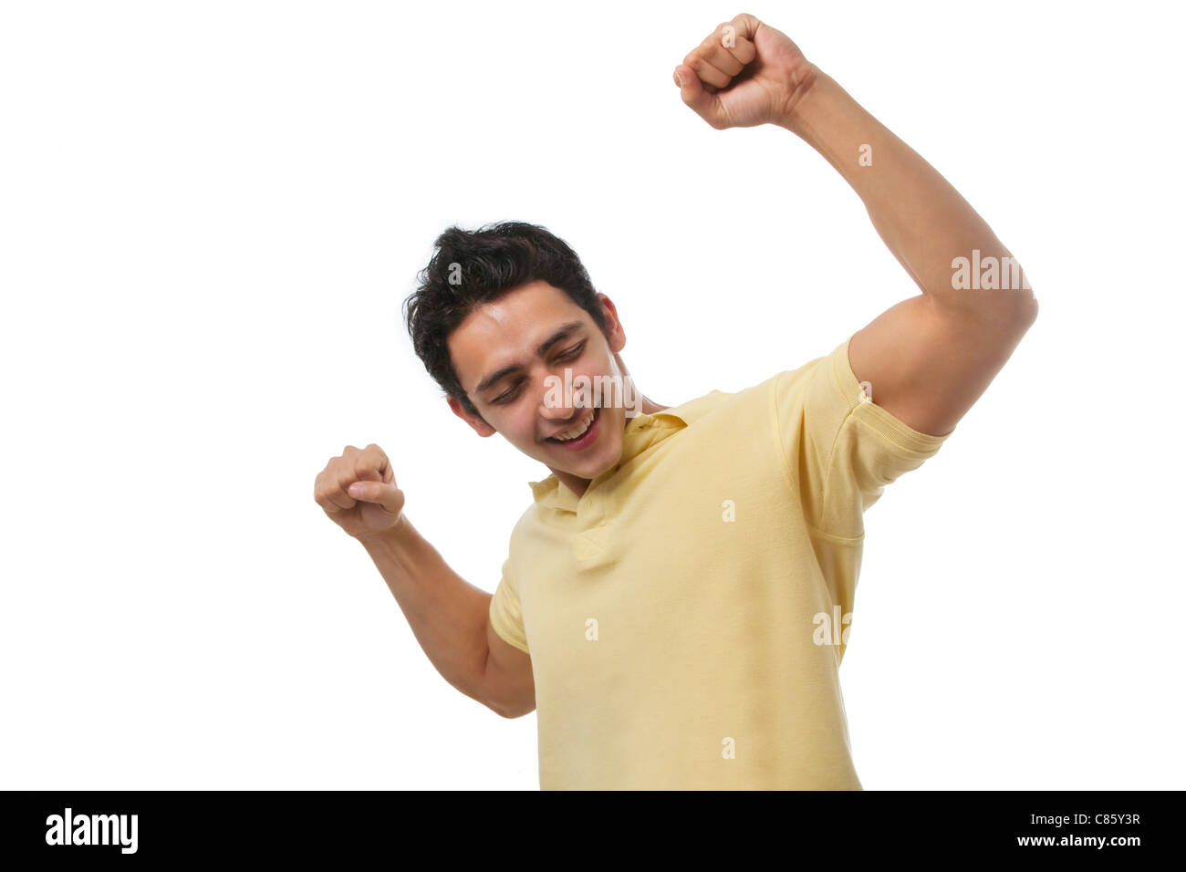 Young boy feeling triumphant Stock Photo - Alamy