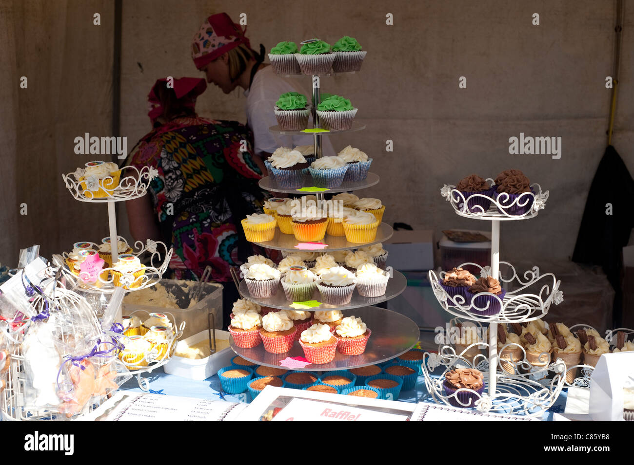 Stand selling colorful cupcakes Stock Photo - Alamy