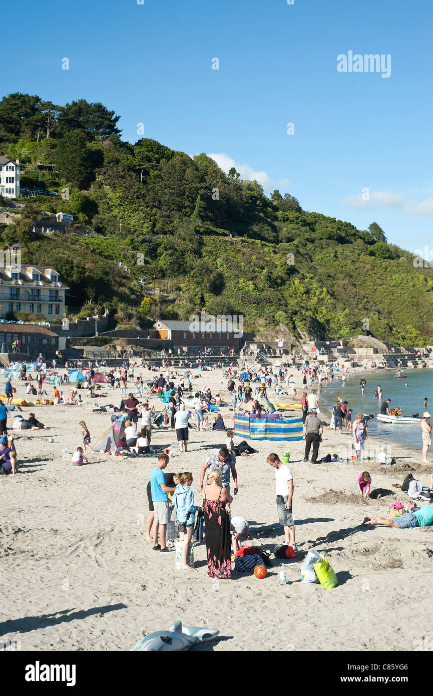 August 2011 - Looe, Cornwall, UK - People at beach Stock Photo - Alamy