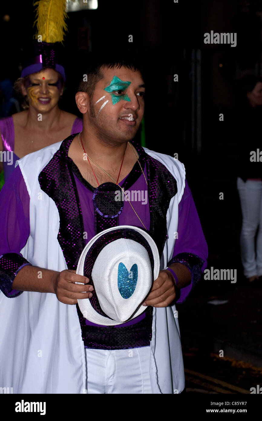 night time dark carnival costume dress performer Stock Photo - Alamy