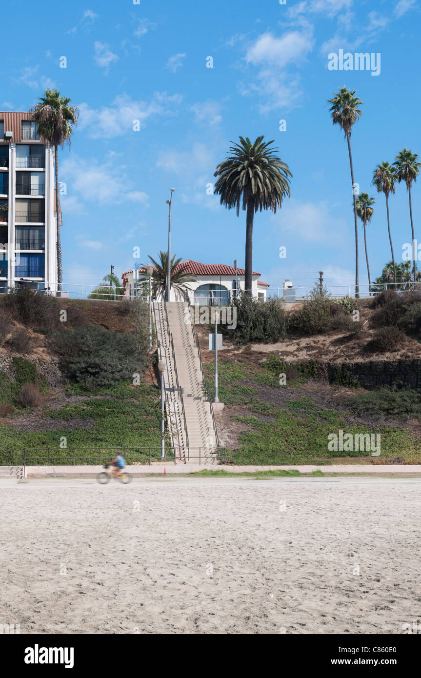 Landscape with bike rider at the beach with staircase Stock Photo - Alamy