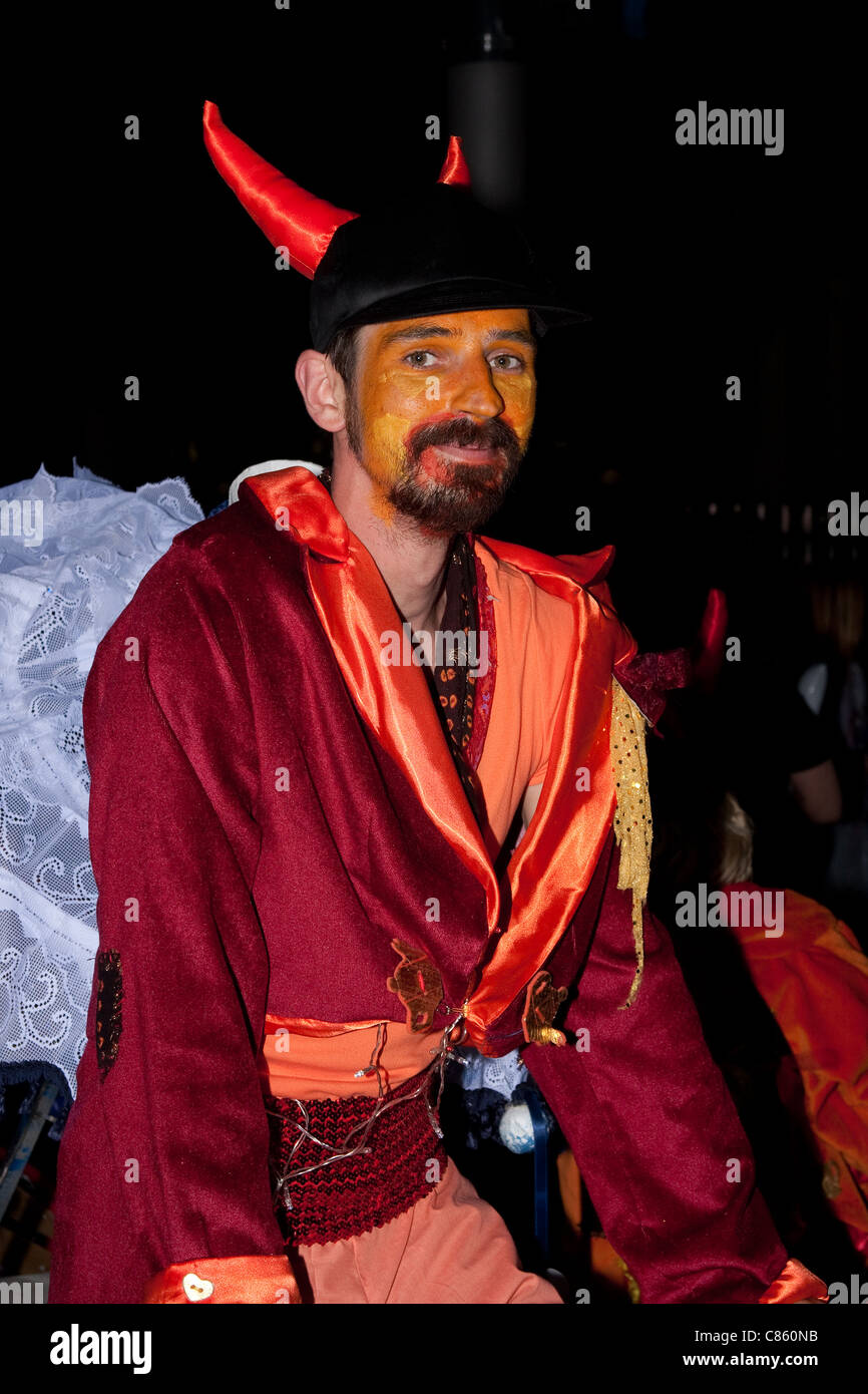 night time dark carnival costume dress performer Stock Photo - Alamy