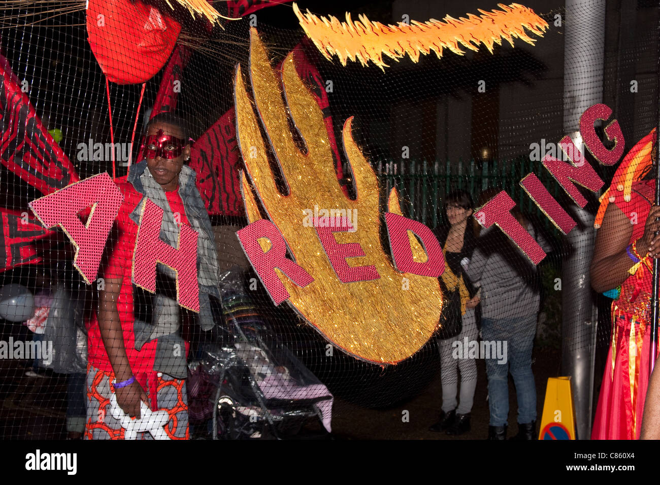 night time dark carnival costume dress performer Stock Photo - Alamy