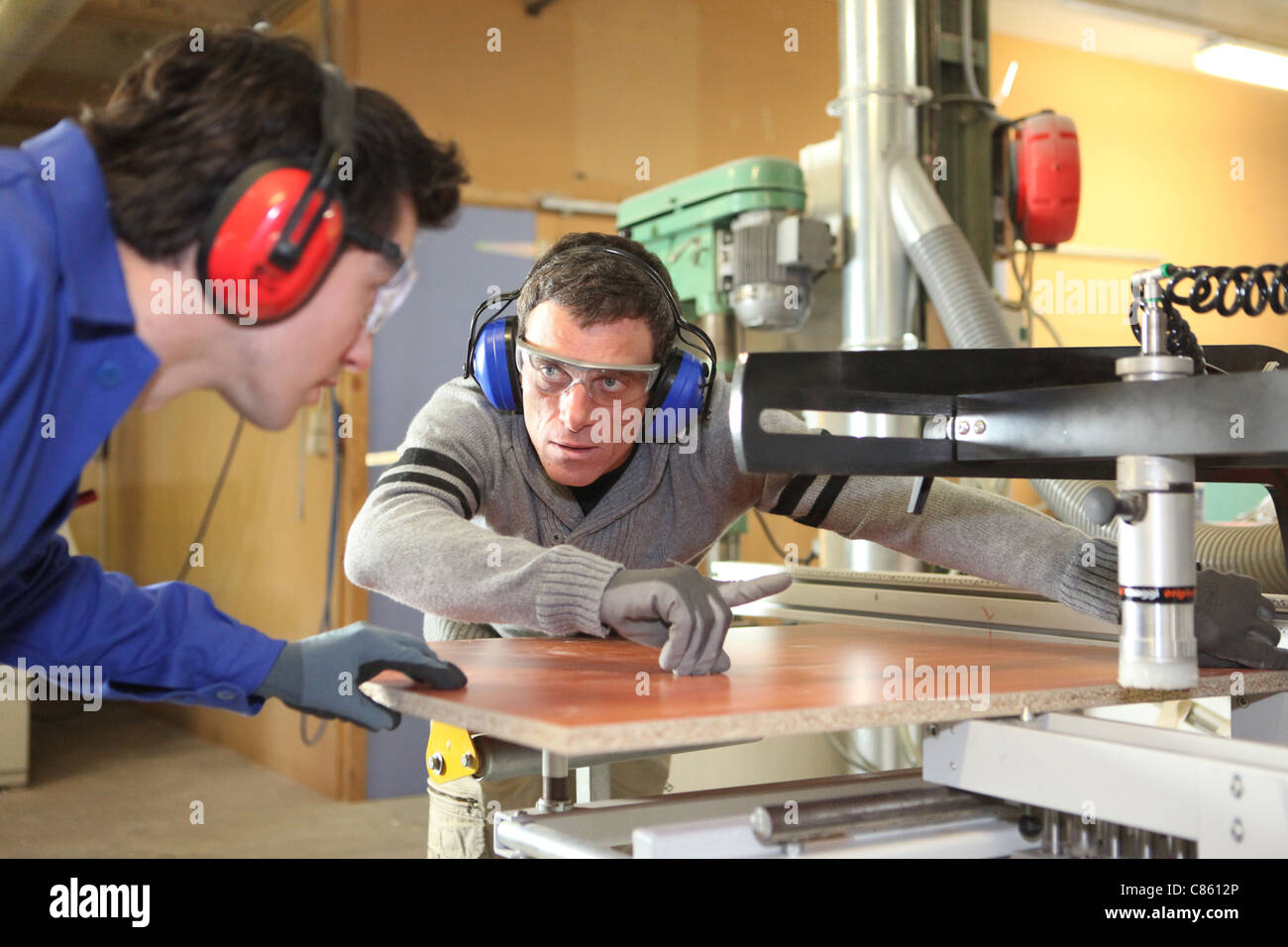 craftsman and his apprentice working together Stock Photo - Alamy