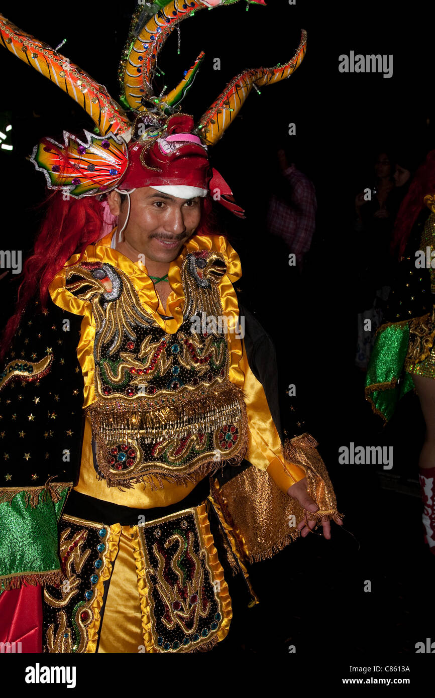 Bolivian male man bright smiling costume night Stock Photo - Alamy
