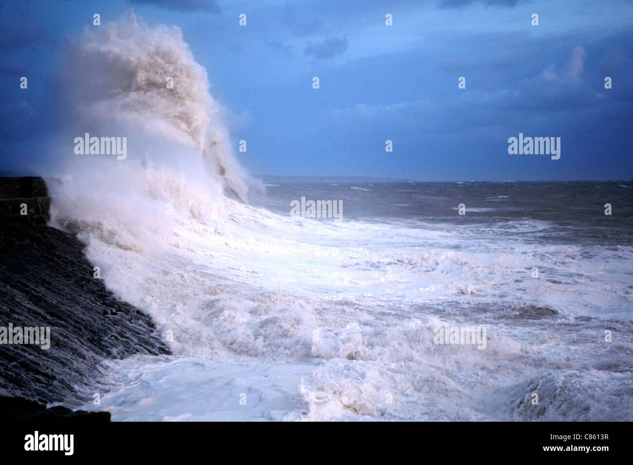 Waves crashing over Porthcawl pier, South Wales Stock Photo - Alamy
