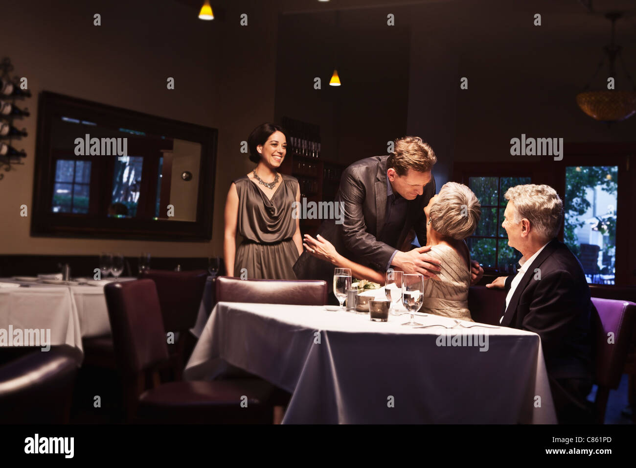 Celebration couple family father and son hugging smiling hi-res stock ...