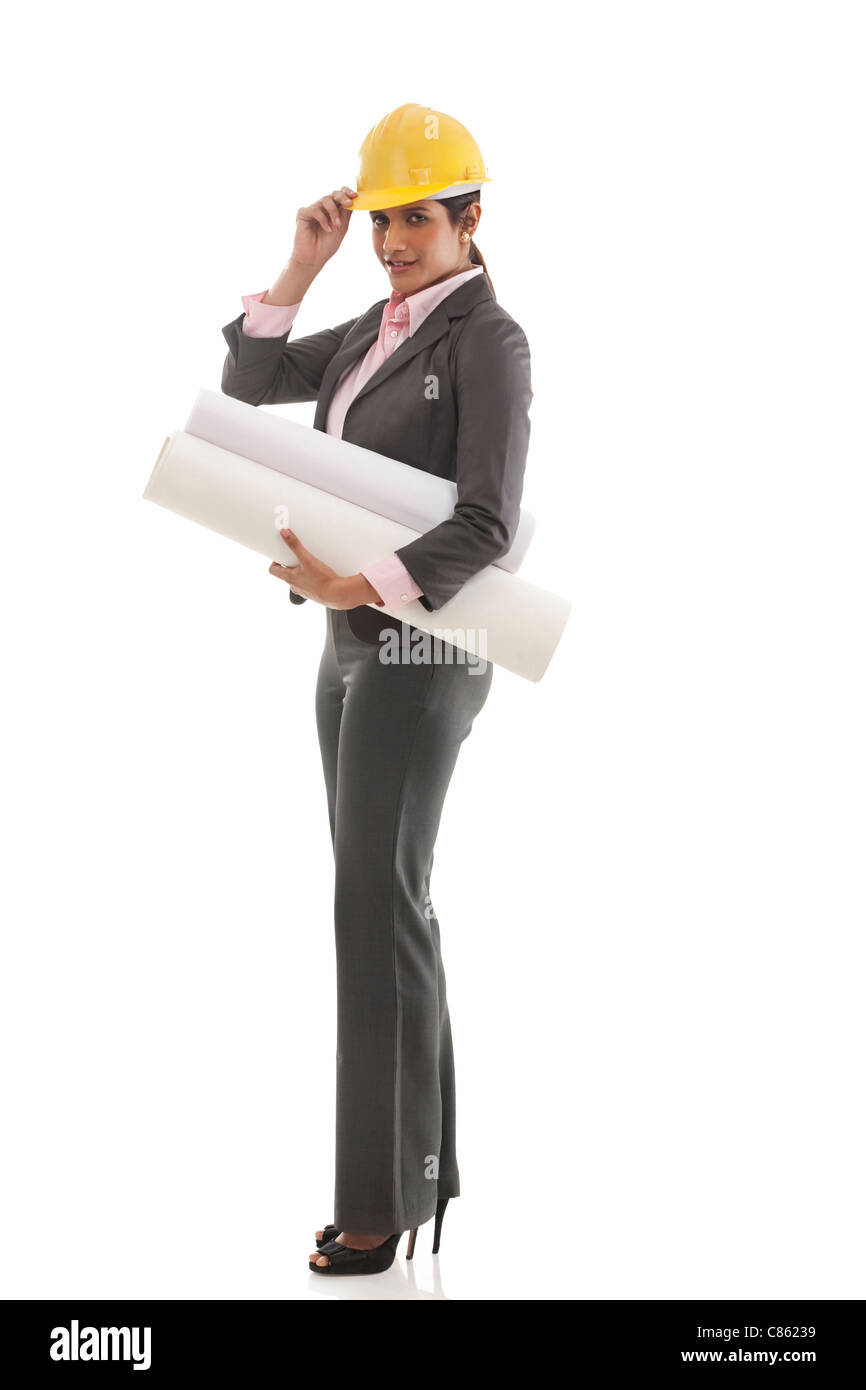 Female engineer with blueprints Stock Photo - Alamy