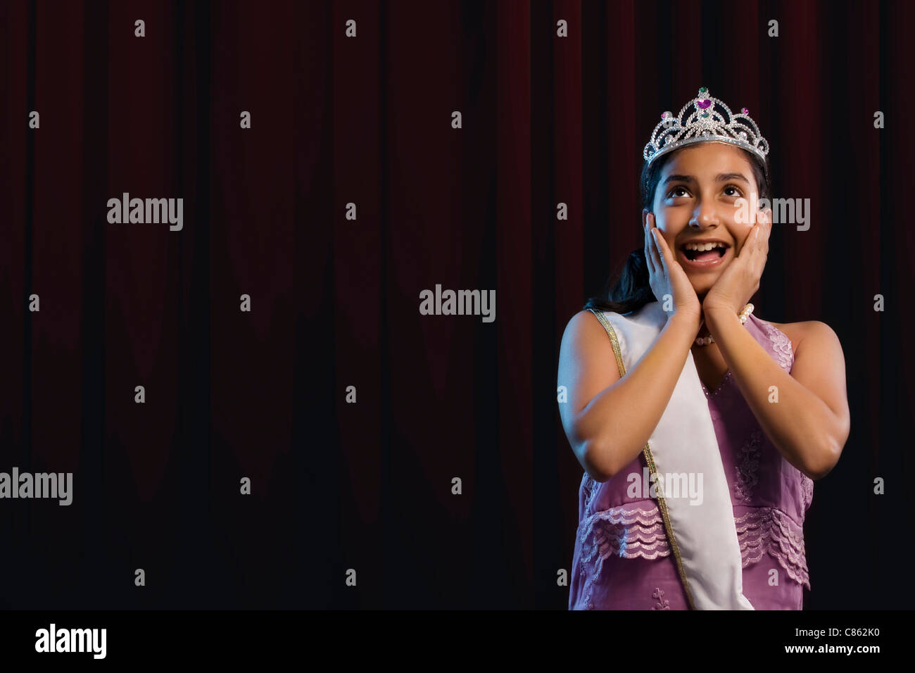 Teenage beauty queen surprised Stock Photo - Alamy