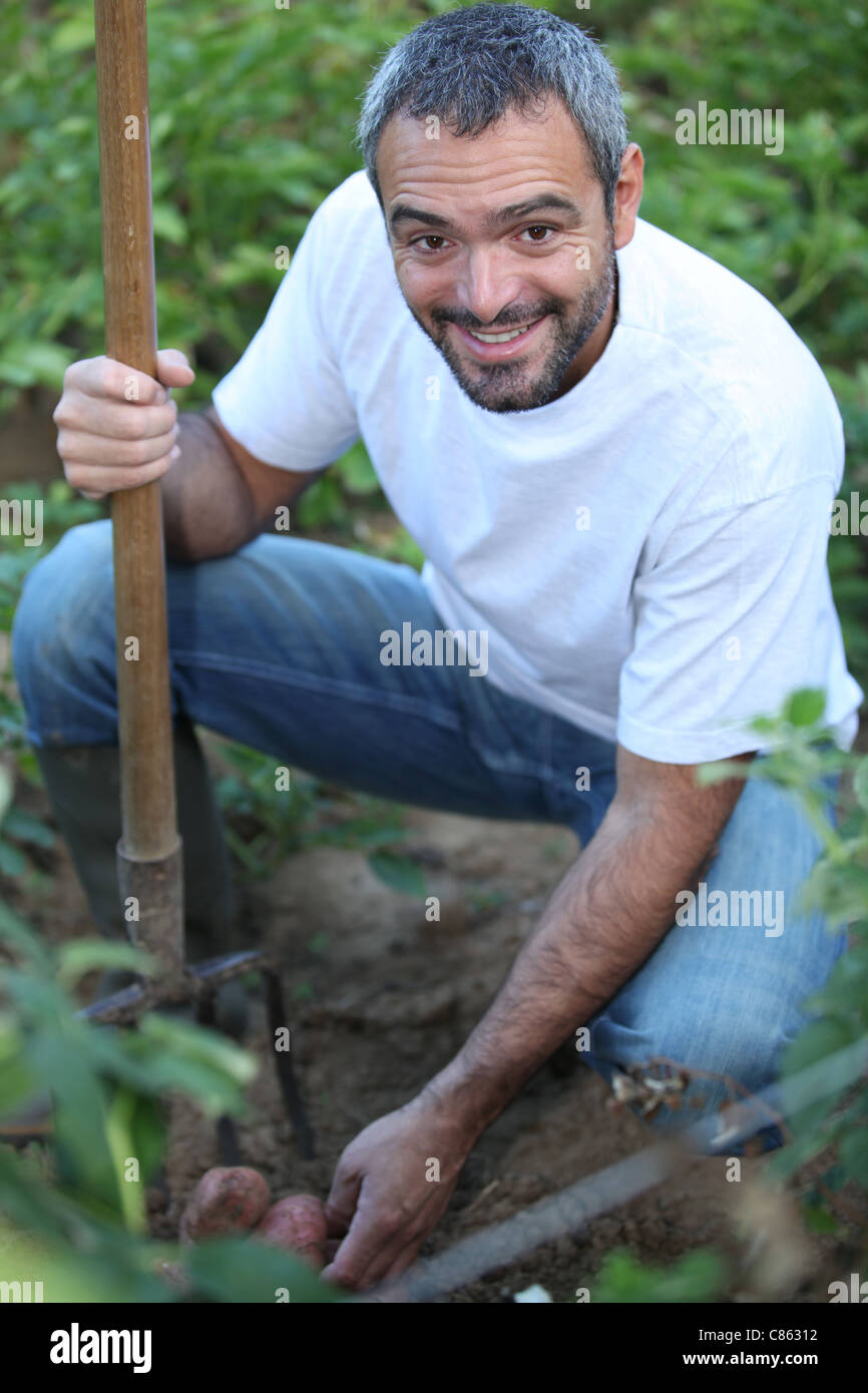 man in his garden Stock Photo - Alamy