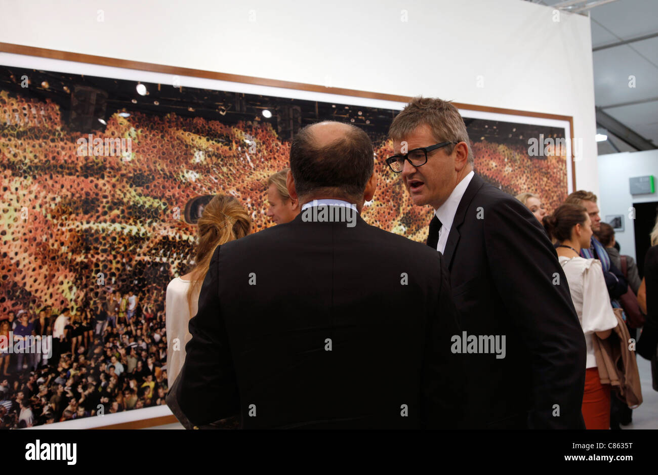 White Cube gallery director Jay Joplin (right) a an exhibition at the ...