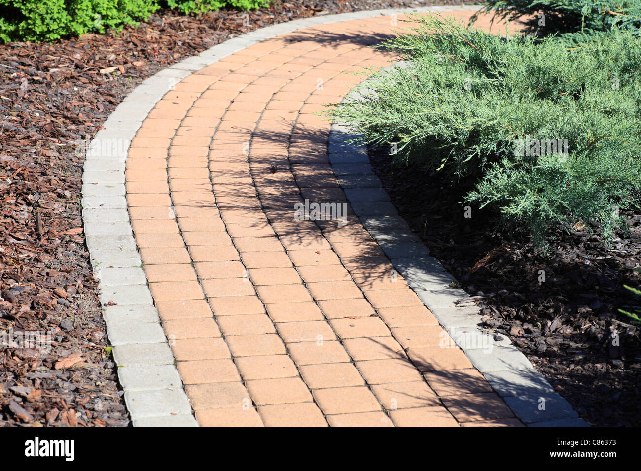 Garden stone path Brick Sidewalk Stock Photo - Alamy