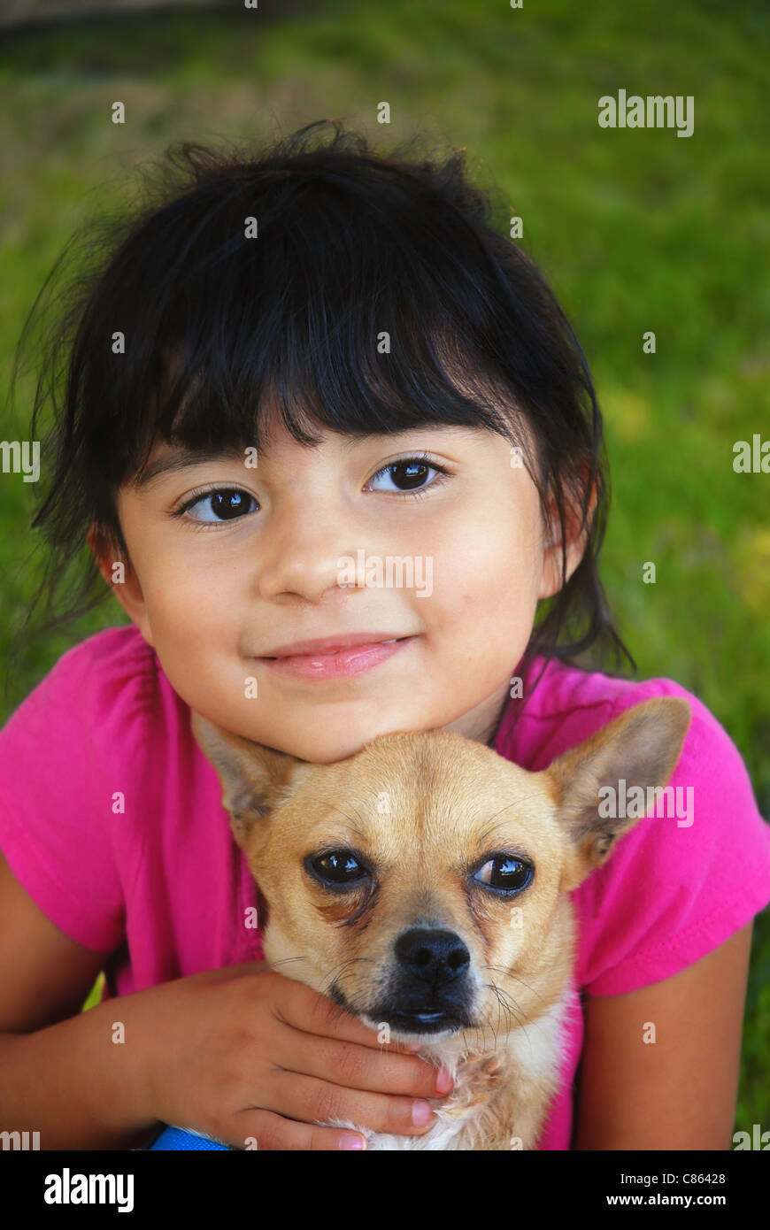 Latino kid with dog hi-res stock photography and images - Alamy