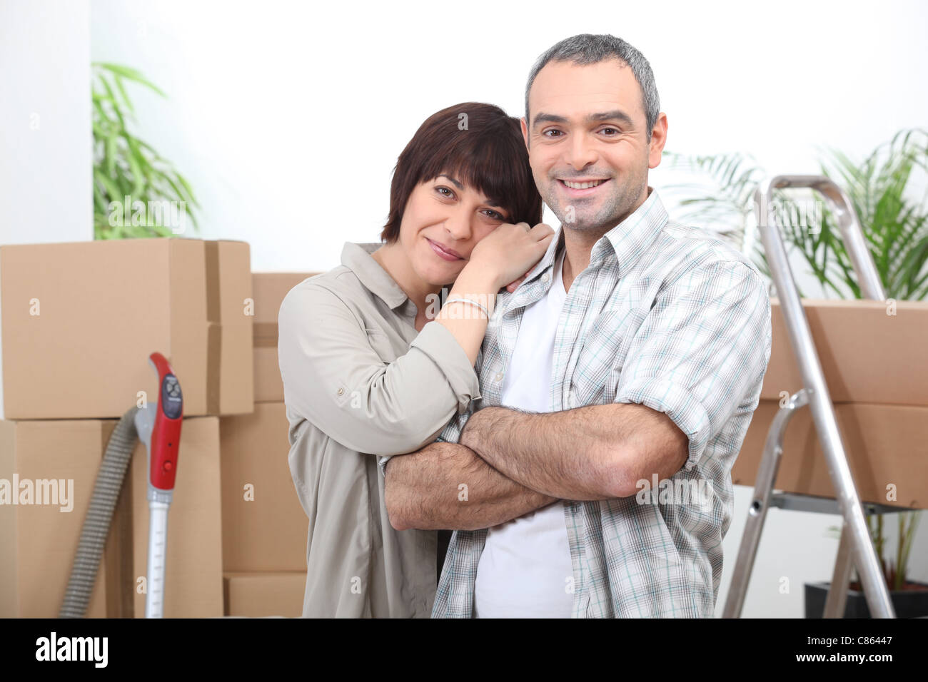 Couple moving house Stock Photo - Alamy