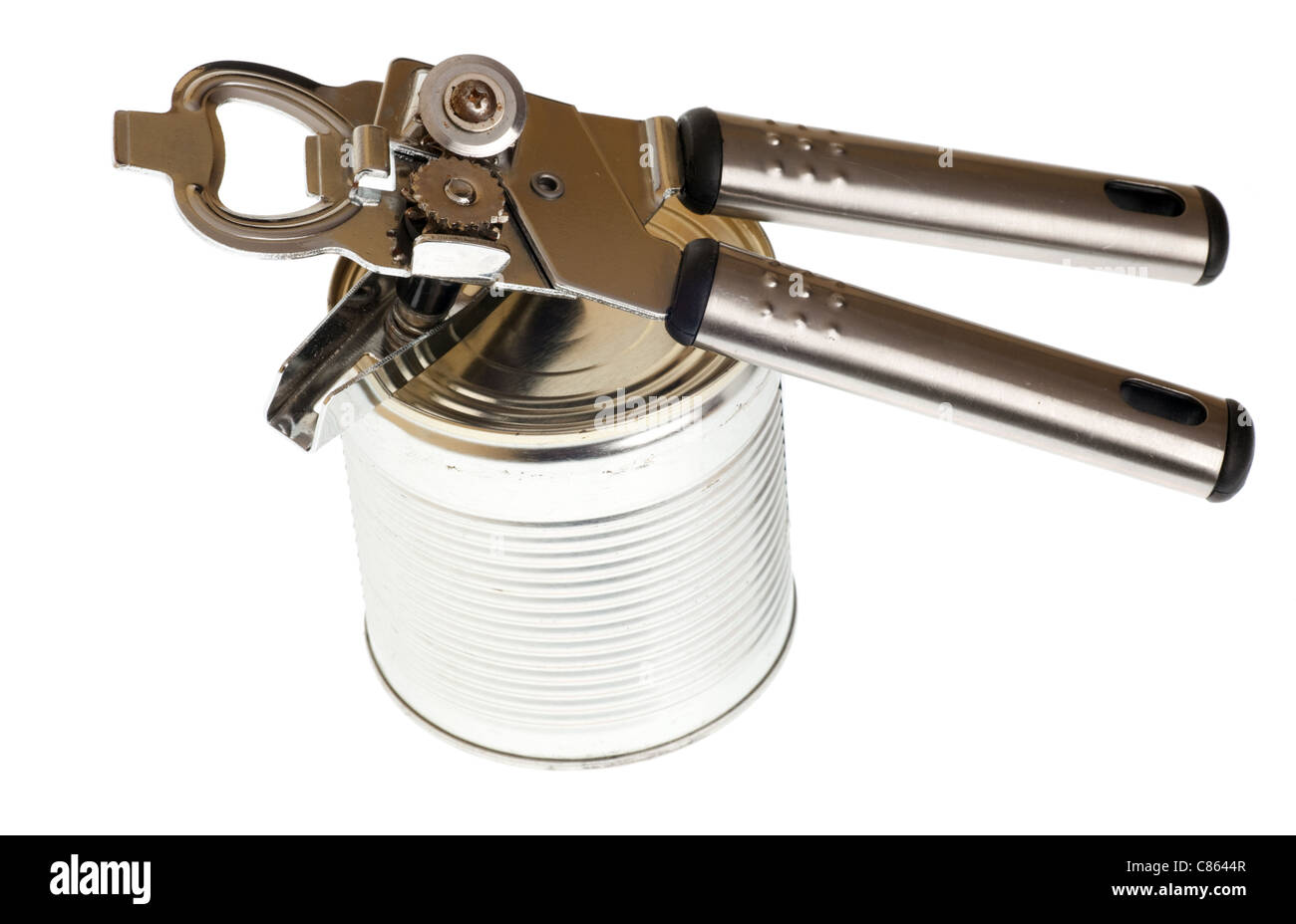 Tin opener opening a can of food isolated on white Stock Photo - Alamy