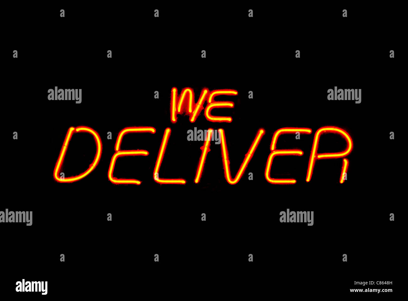 We Deliver neon sign isolated on black background Stock Photo - Alamy
