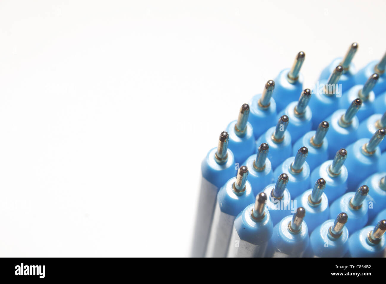 image of blue biro pens against white background Stock Photo - Alamy