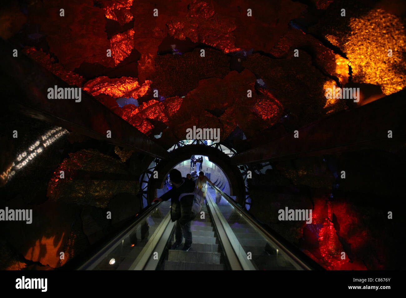 The Earth Gallery with moving staircase through the model of the Earth ...