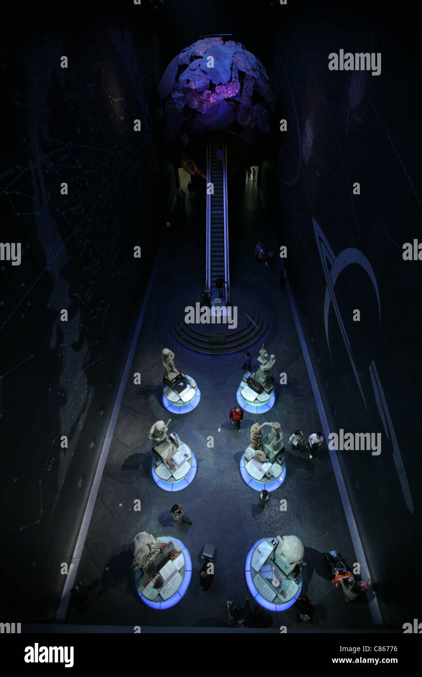 The Earth Gallery with moving staircase through the model of the Earth ...