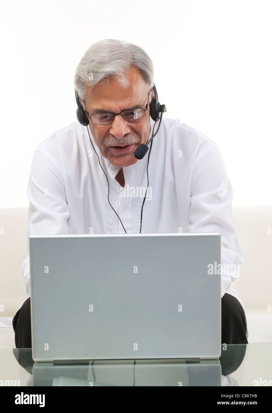 Old man with a laptop Stock Photo - Alamy