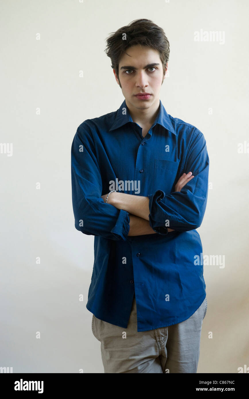 Male with arms folded, portrait Stock Photo - Alamy