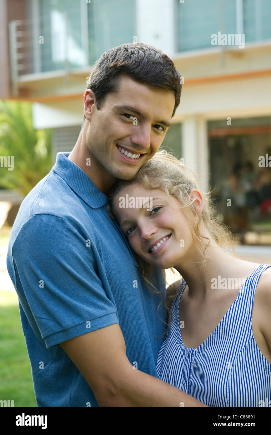 Couple together outdoors, portrait Stock Photo - Alamy