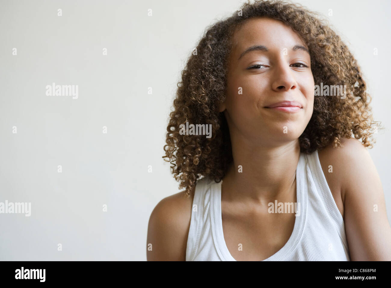 Smiling woman portrait plain background hi-res stock photography and ...