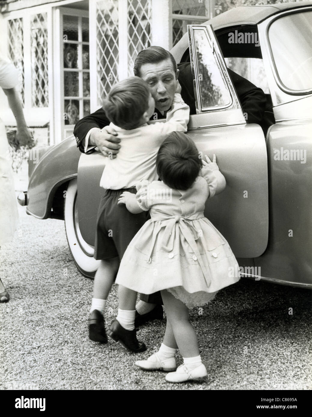 NORMAN WISDOM (1915-2010) English comic actor about 1958 with son ...