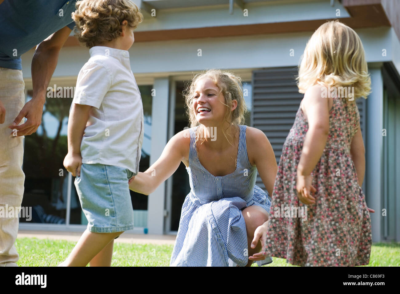 Family having fun together outdoors Stock Photo - Alamy