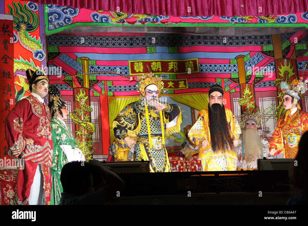Chinese opera performers on stage Stock Photo - Alamy
