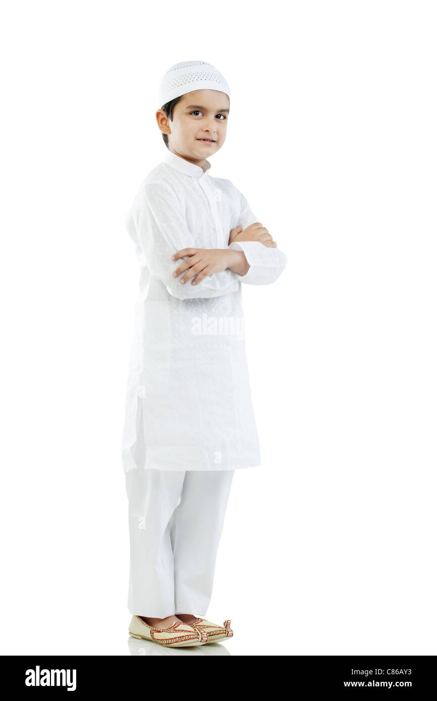 Muslim boy standing Stock Photo - Alamy