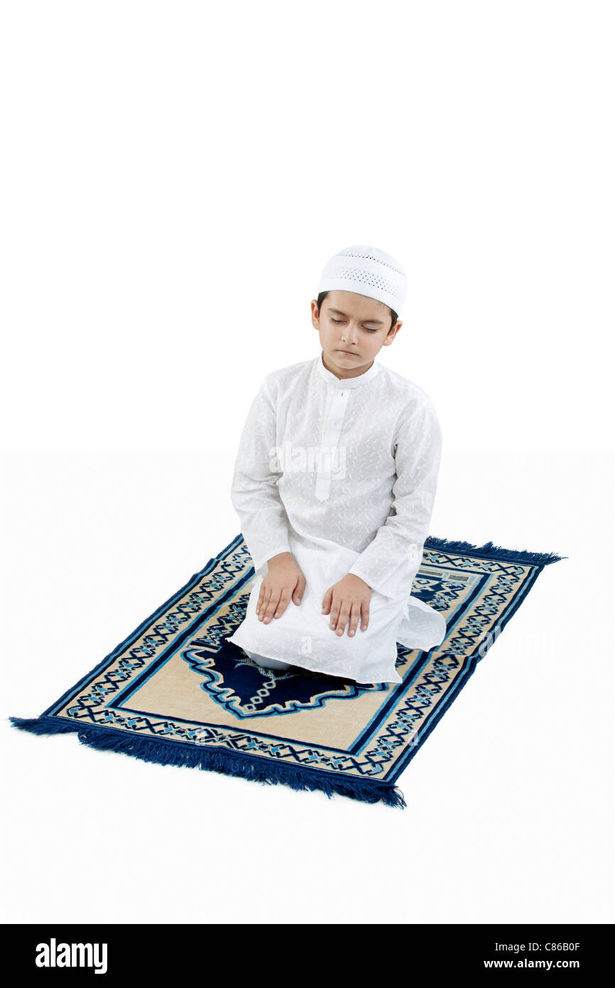 Muslim boy praying Stock Photo - Alamy