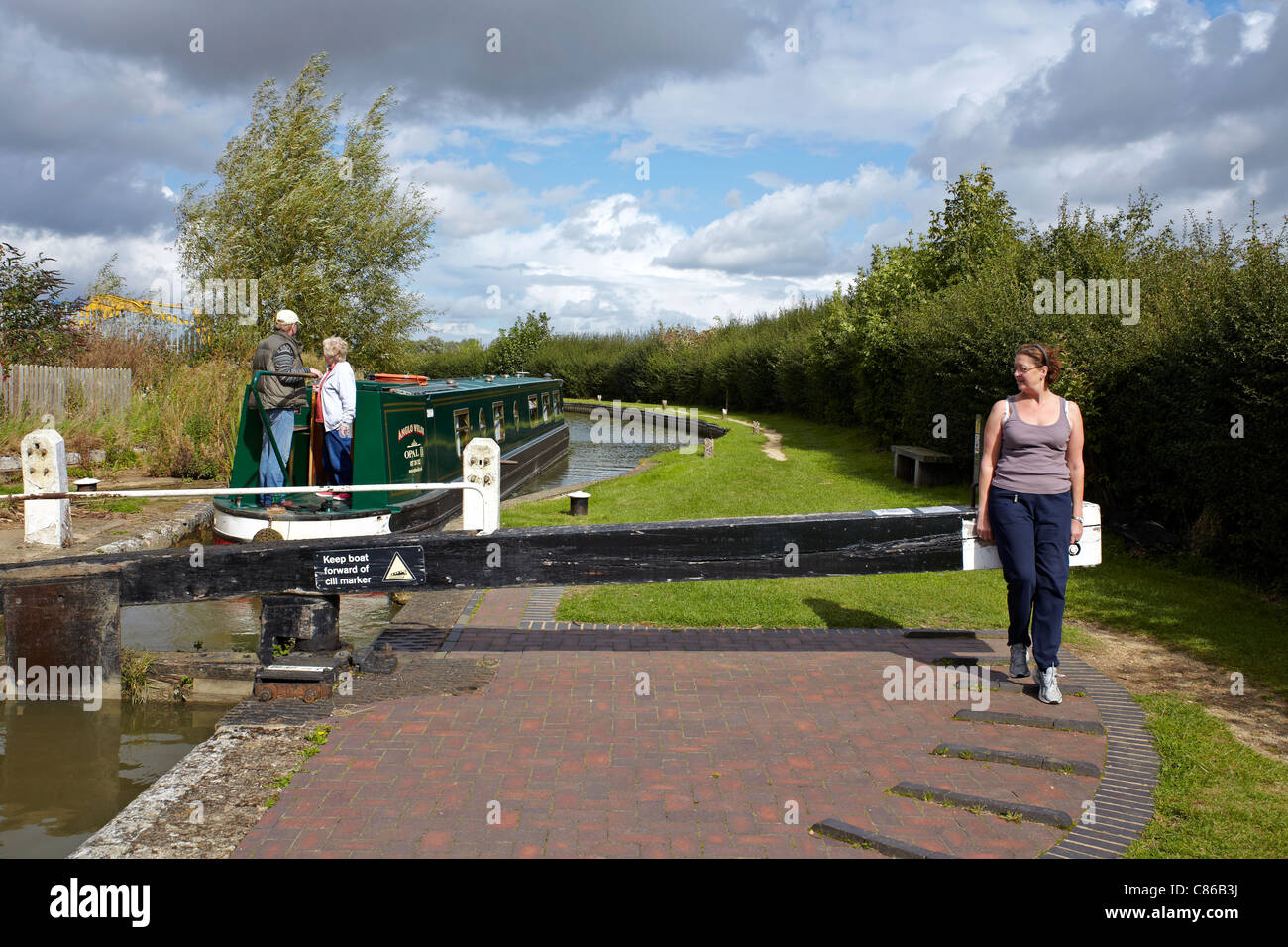 Woman operating locks hi-res stock photography and images - Alamy