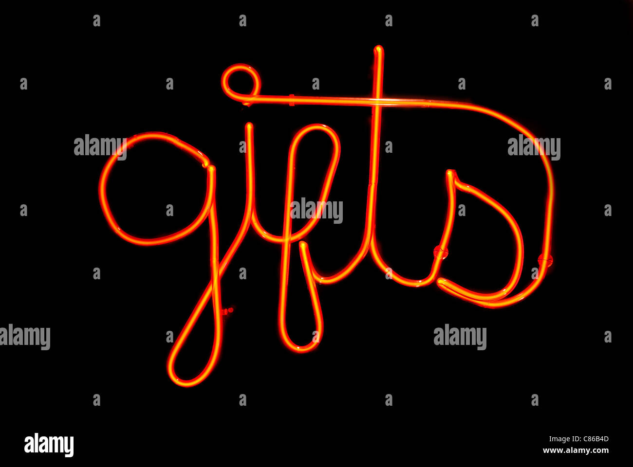Red gifts neon sign isolated on black background Stock Photo - Alamy
