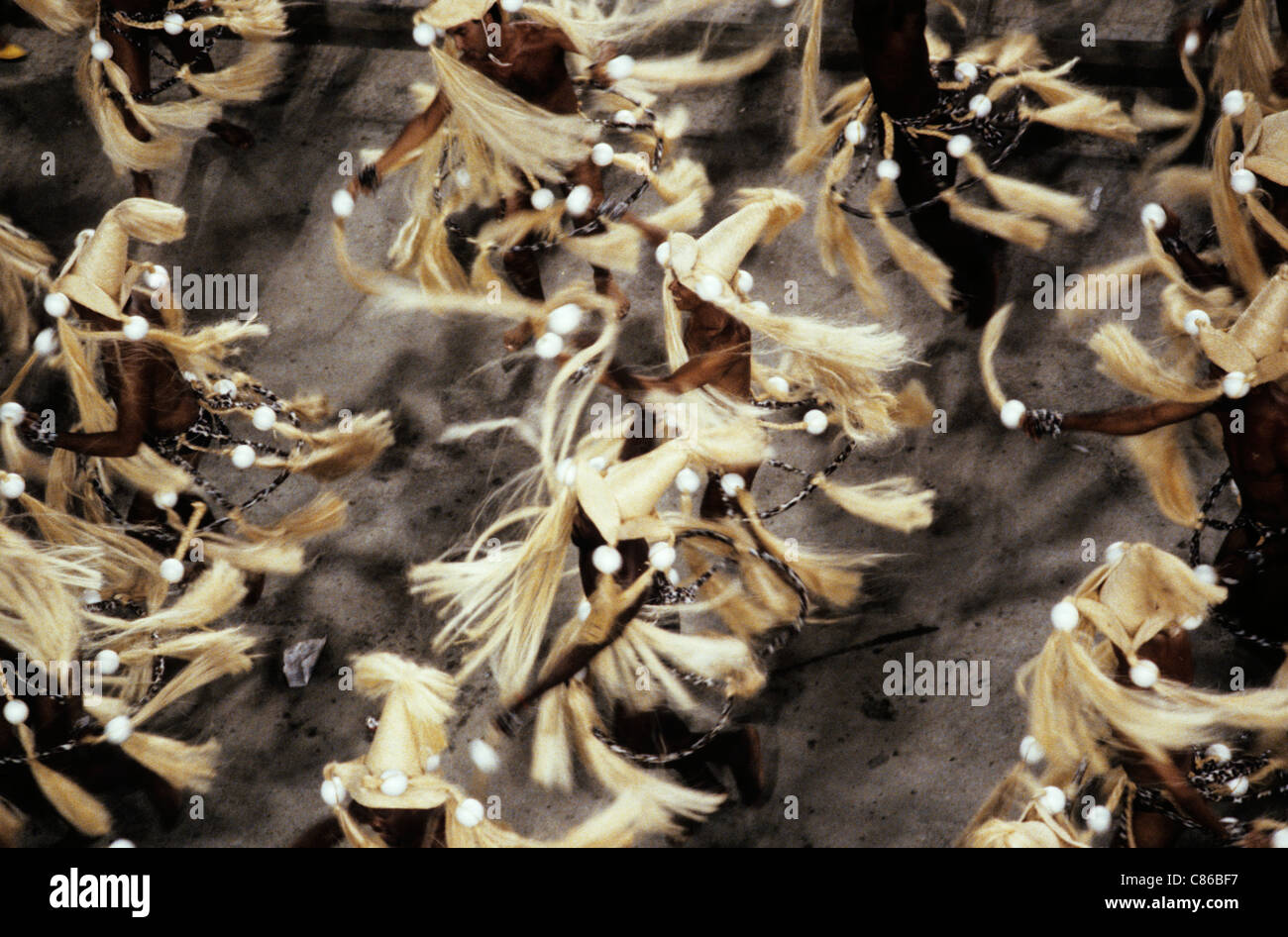 Rio de Janeiro, Brazil. Samba school; rows of men whirling with hats ...