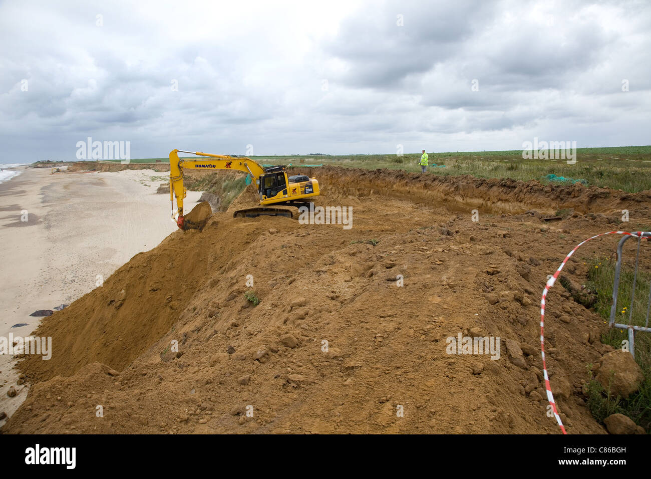 Komatsu PC 290 LC tracked 360 excavator at work on a coastal erosion ...